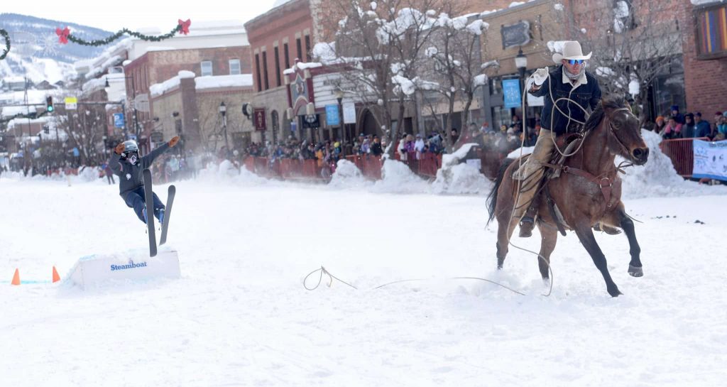8-year-old flies 35 feet to win donkey jump at Winter Carnival Street ...